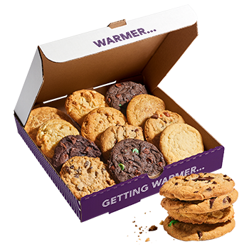A box of assorted cookies, including chocolate chip and other varieties ...